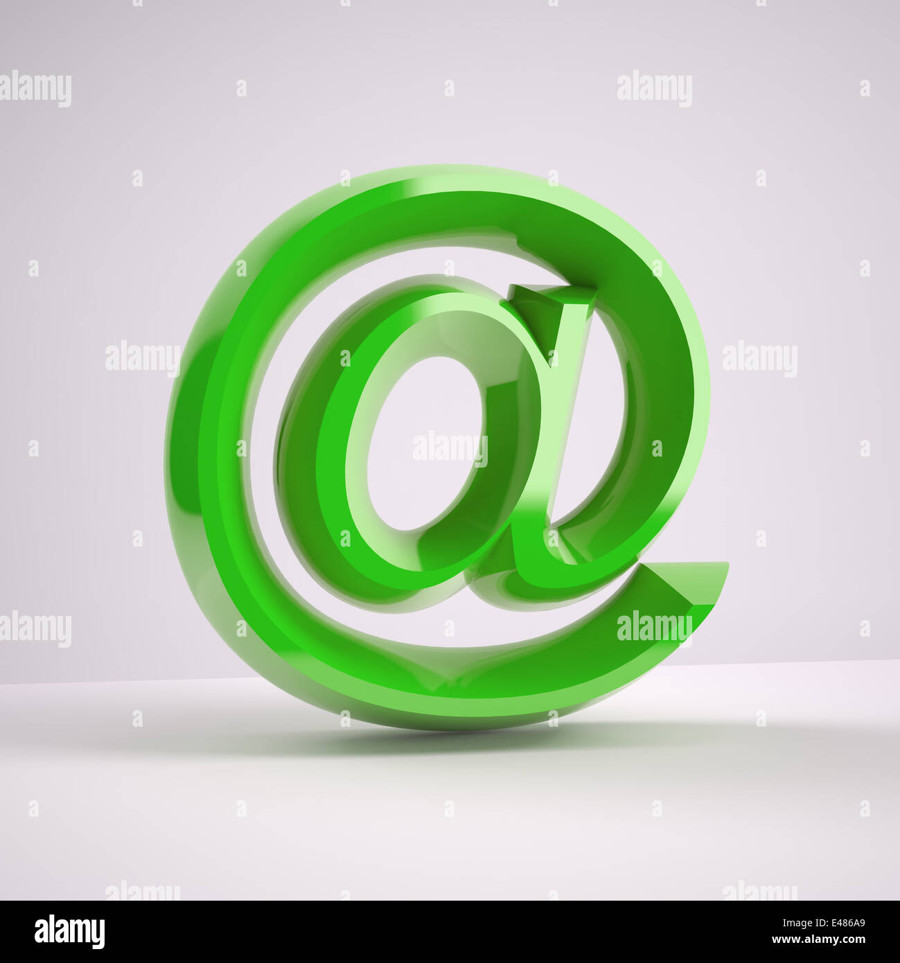 GREEN shiny at e-mail symbol Stock Photo - Alamy