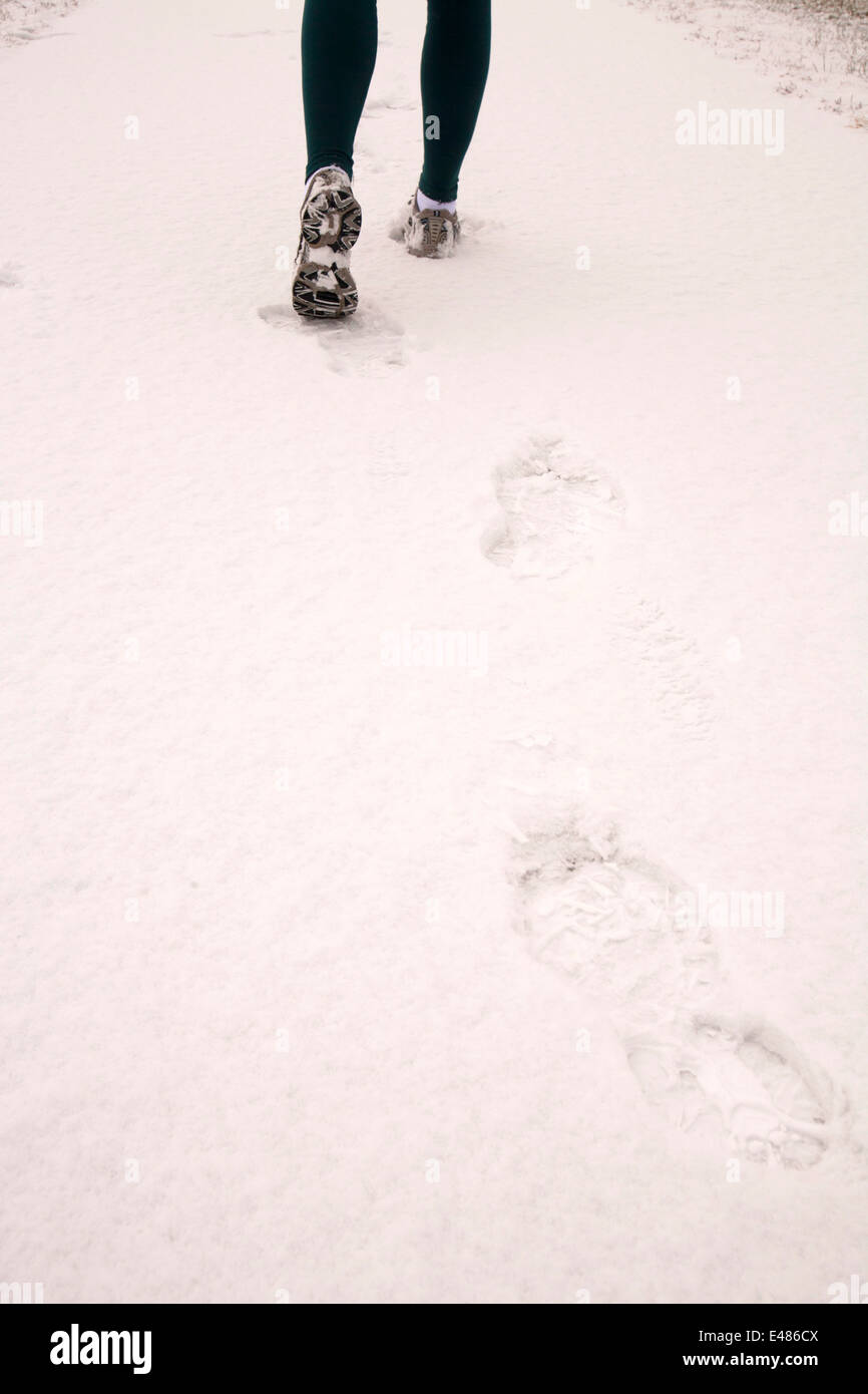 Female footprints in snow hi-res stock photography and images - Alamy