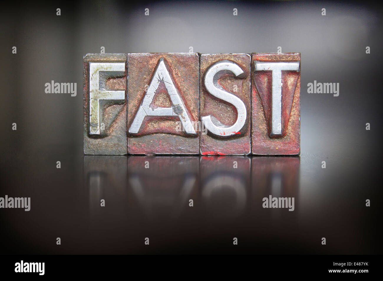 The word FAST written in vintage letterpress type Stock Photo - Alamy