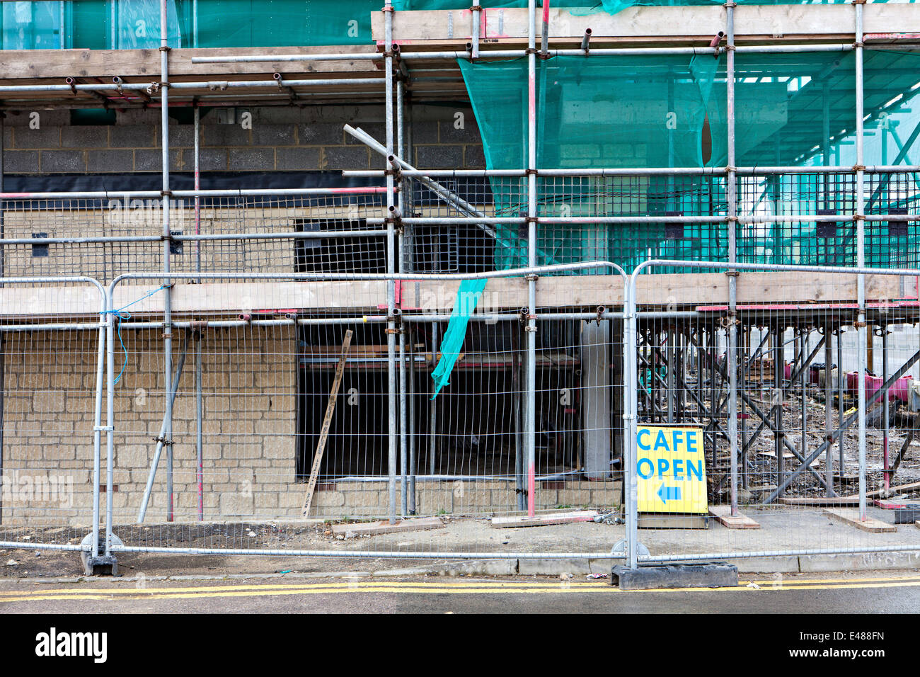 Construction site and Cafe Open sign on new housing estate Stock Photo ...