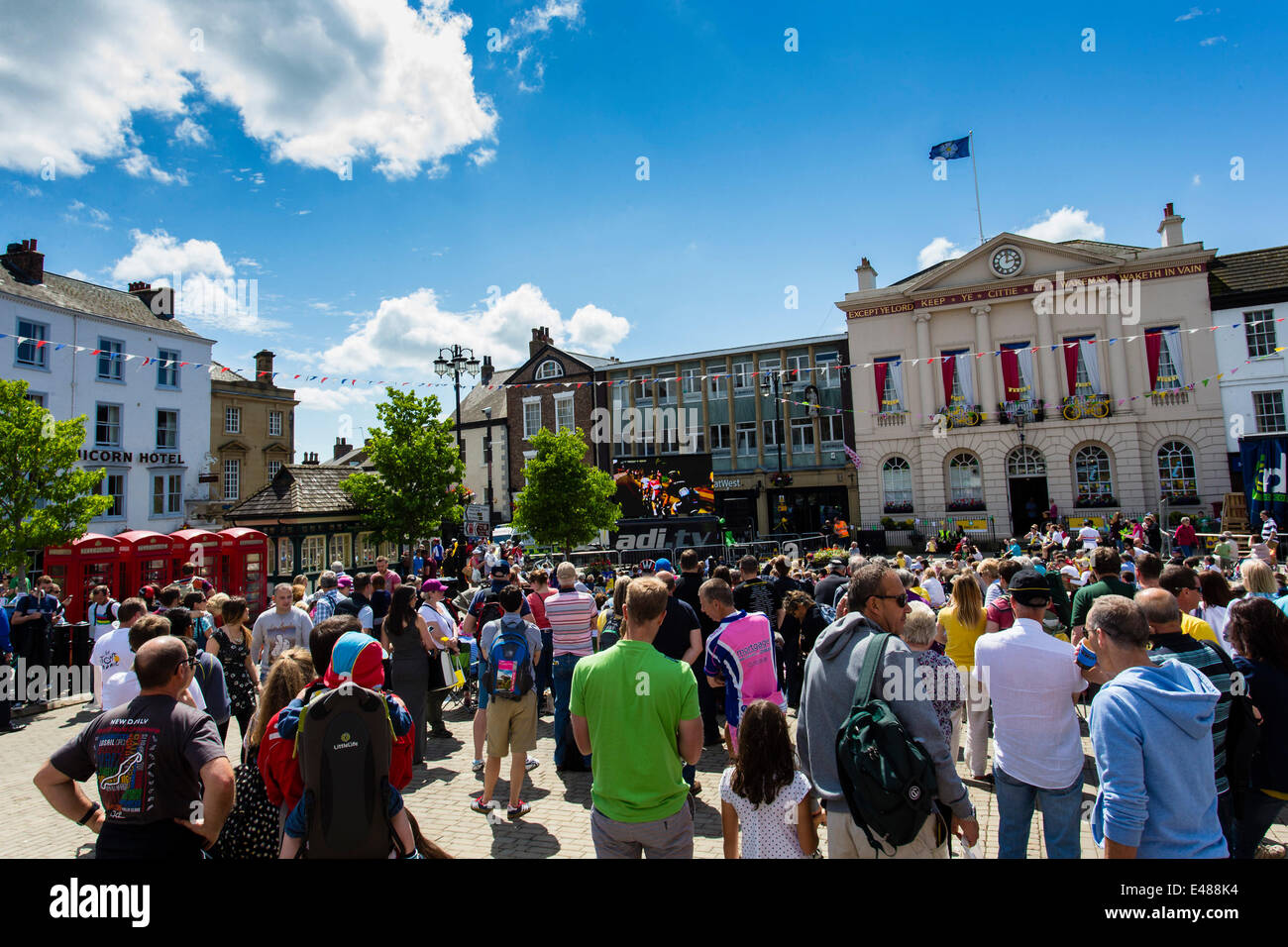 Leeds, Yorkshire, UK. July 5th 2014. Fans gather in the centre of Ripon ...