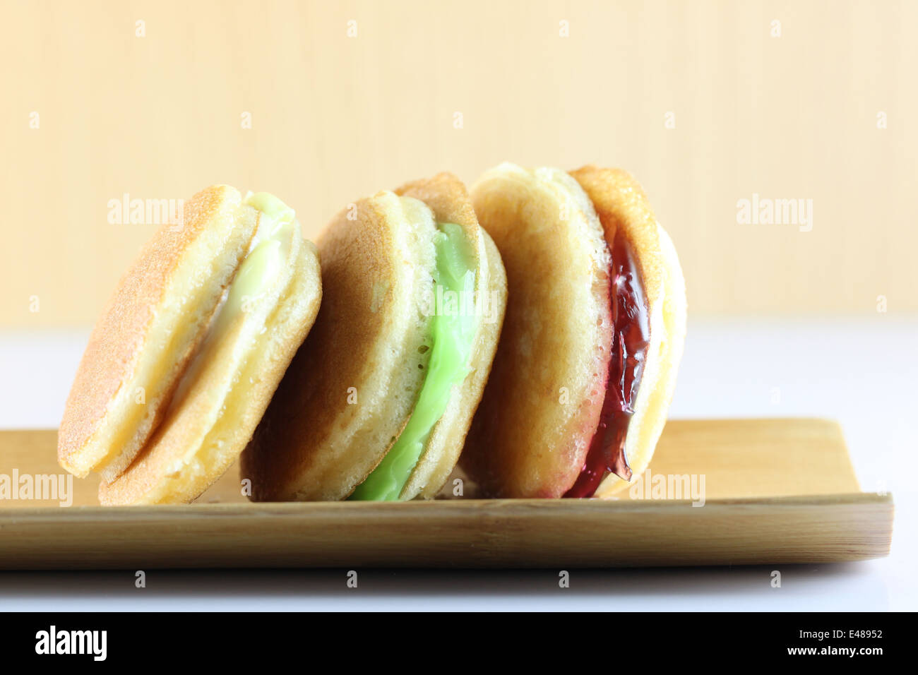 Thailand macaroon on bamboo dish for foods background Stock Photo - Alamy