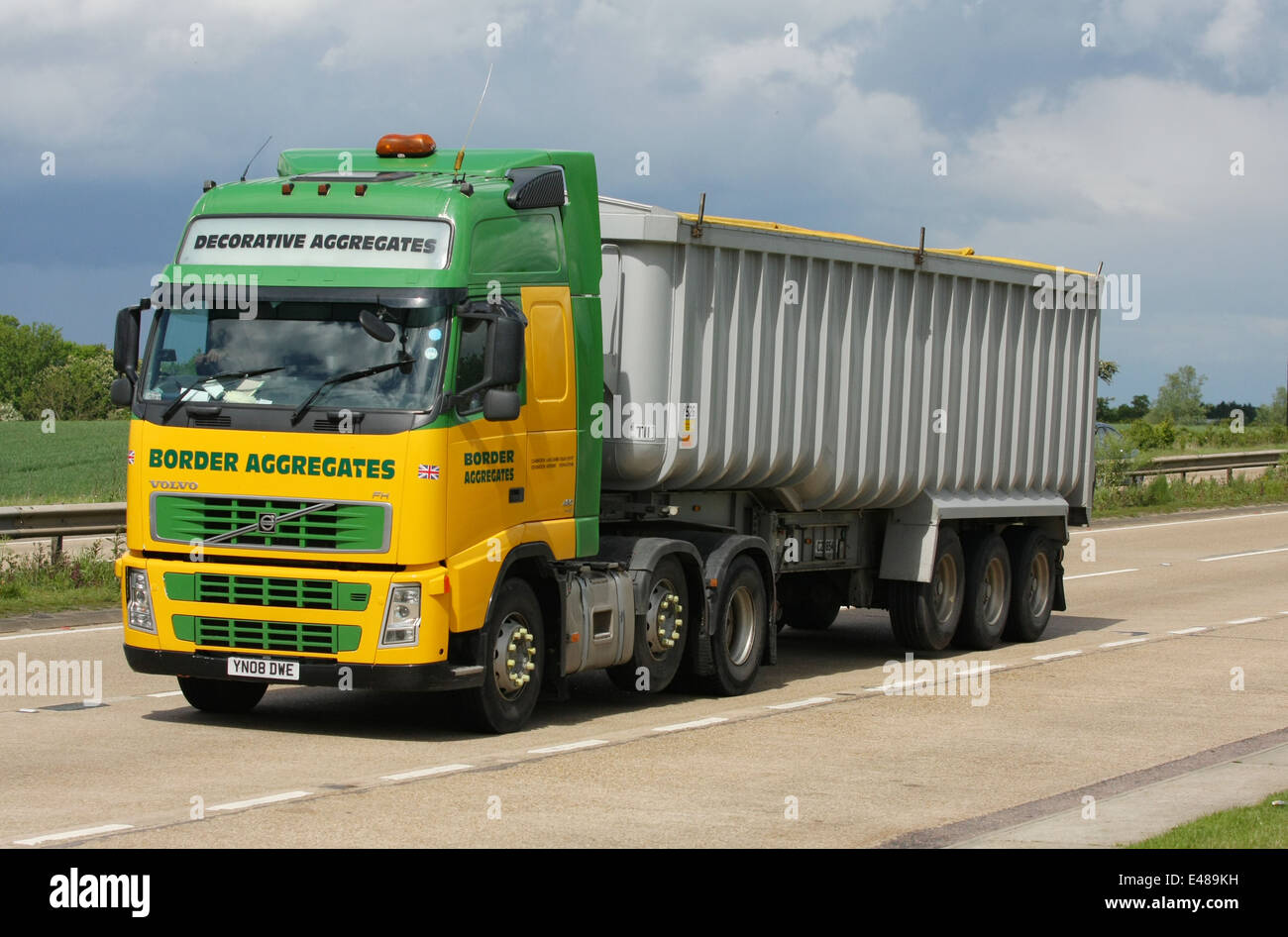 A Border Aggregates articulated tipping truck traveling along the A12 ...
