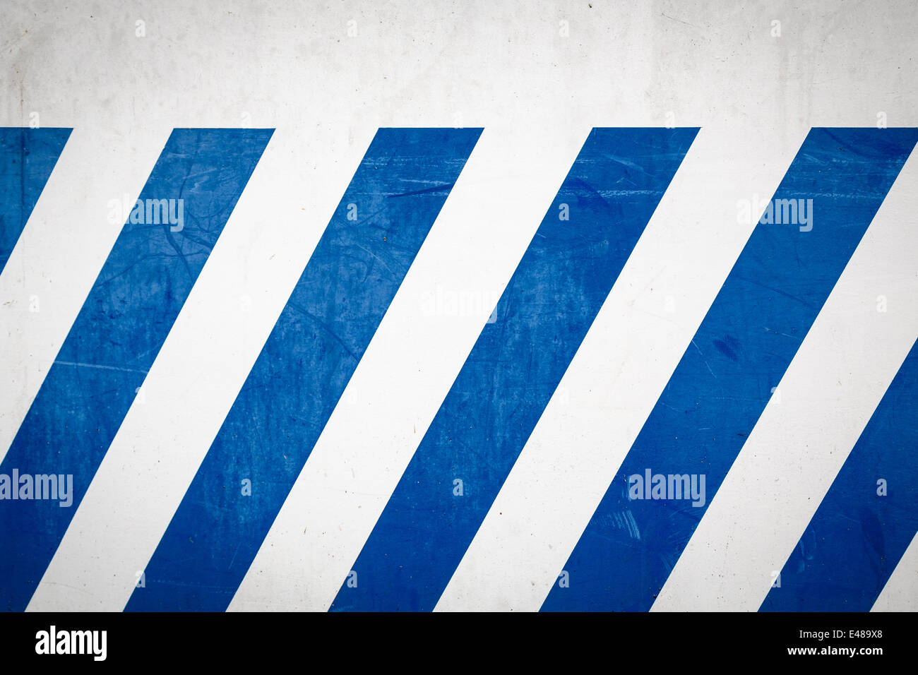 blue diagonal stripes on a white wall Stock Photo - Alamy