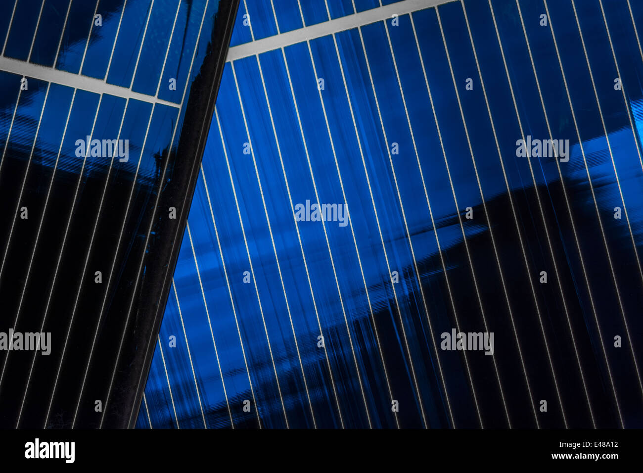 Macro-photo of sections of individual silicon PV solar cell. See NOTE ...