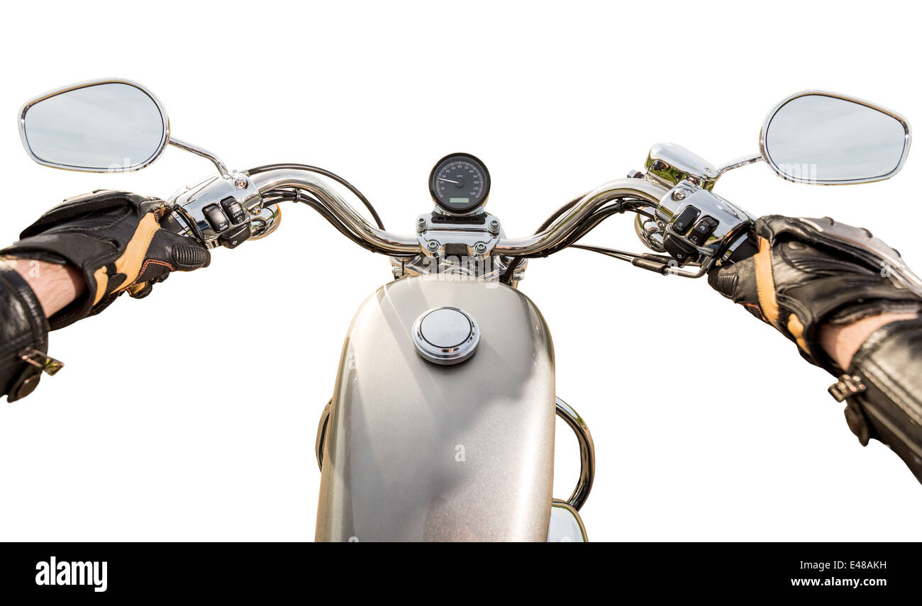 Biker driving a motorcycle isolated on white background. First-person ...