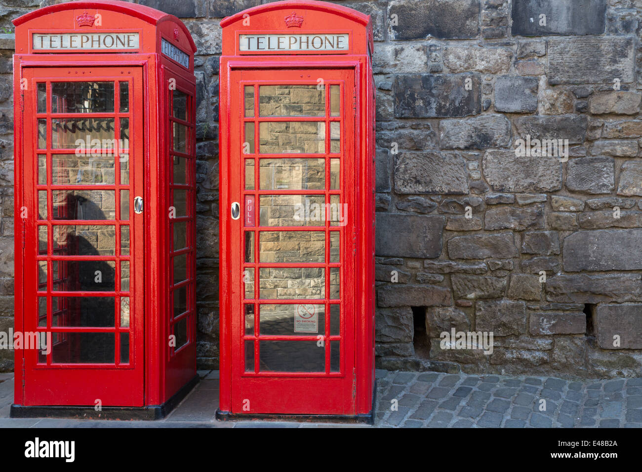 Front view of Classic red British telephone box Stock Photo - Alamy