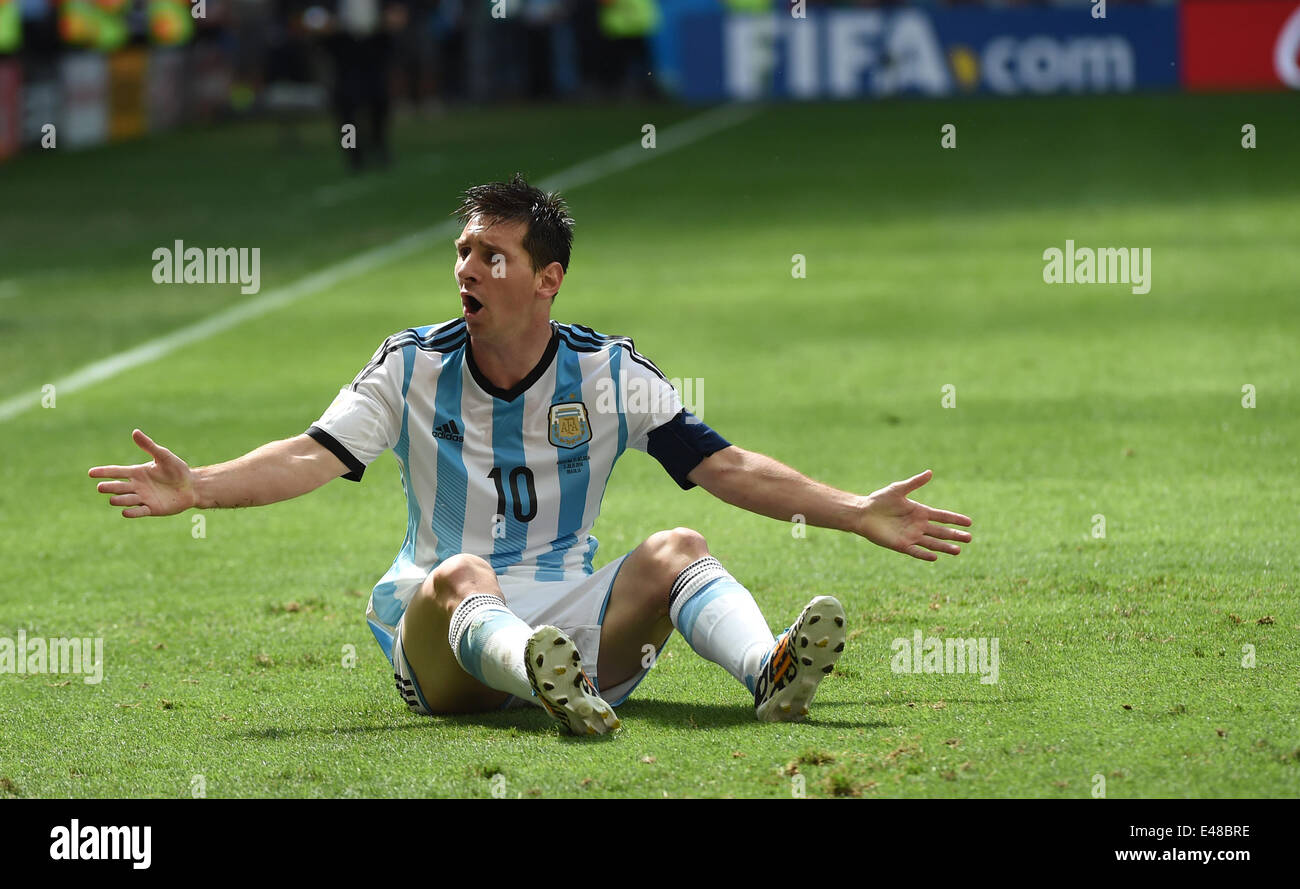 Brasilia, Brazil. 5th July, 2014. Argentina's Lionel Messi falls down ...