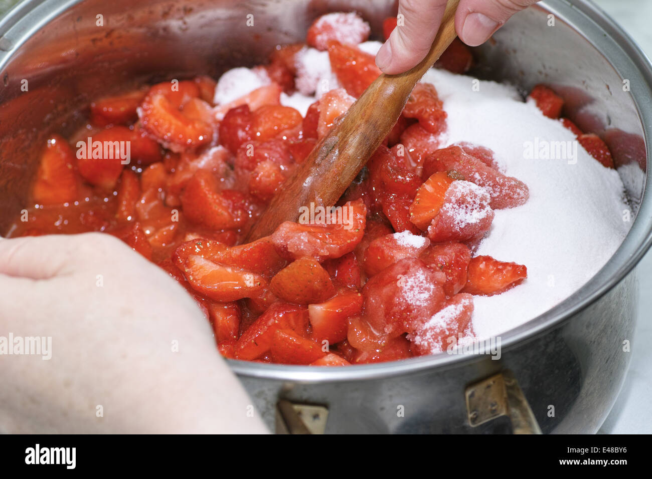 In the Polish kitchen. Preparing a delicious strawberry jam Stock Photo ...