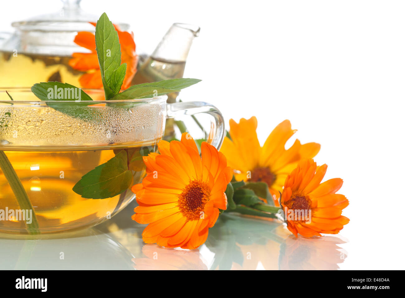 Calendula tea in a cup Stock Photo - Alamy