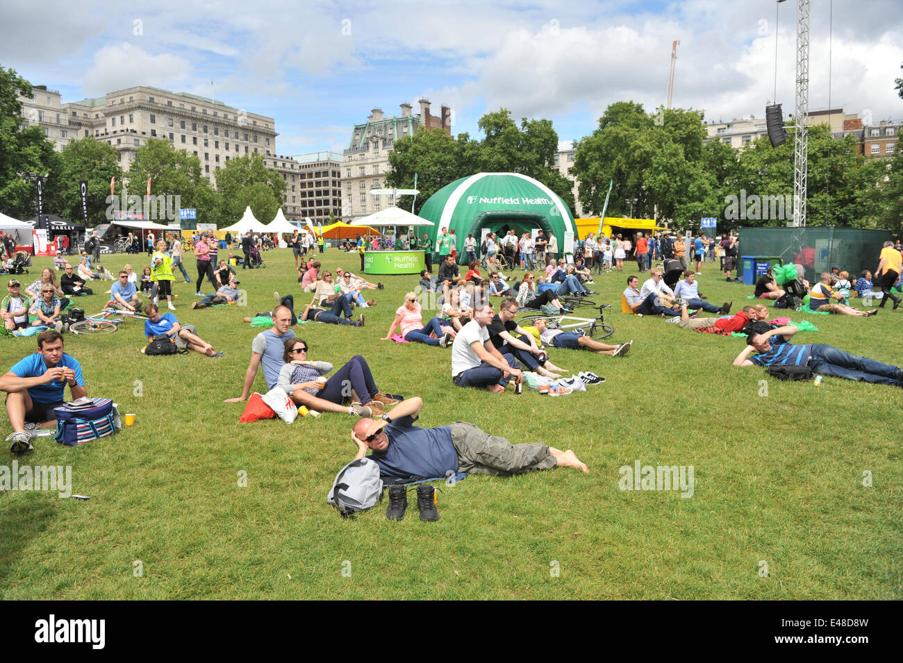 While watching the big screen at fan park hi-res stock photography and ...