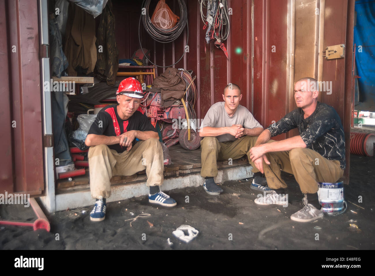 Workers have a rest during lunch break Stock Photo - Alamy