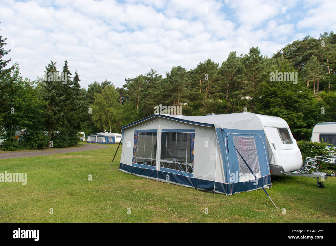 Camping with caravan and shelter in nature Stock Photo - Alamy