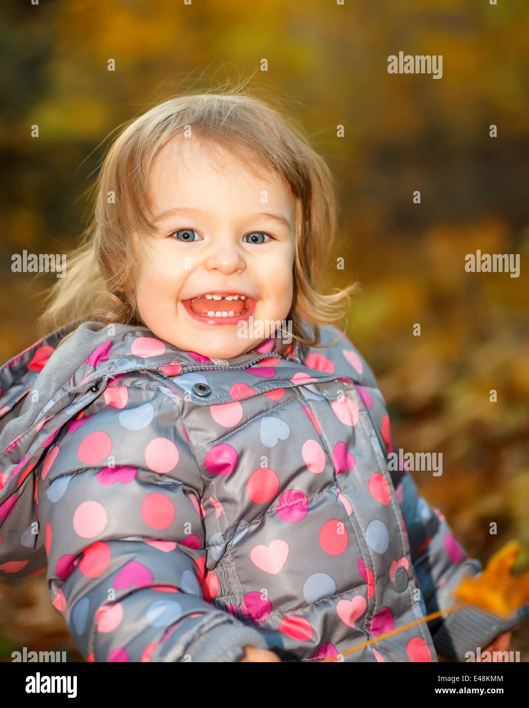 Little girl in the park Stock Photo - Alamy