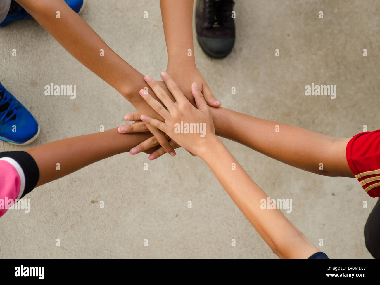 children hand for power and unity Stock Photo - Alamy