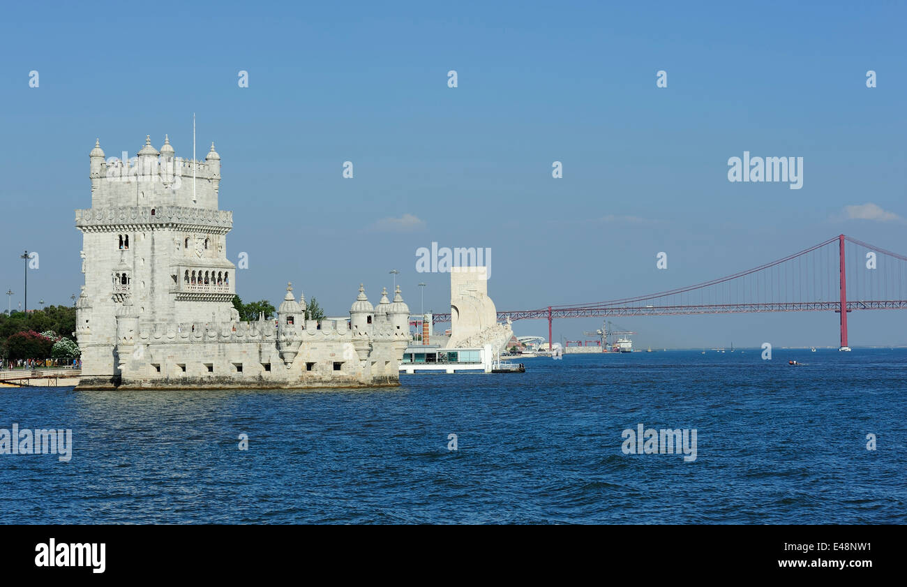 Torre de Belem and The 25th of April Bridge, Lisbon, Portugal Stock ...