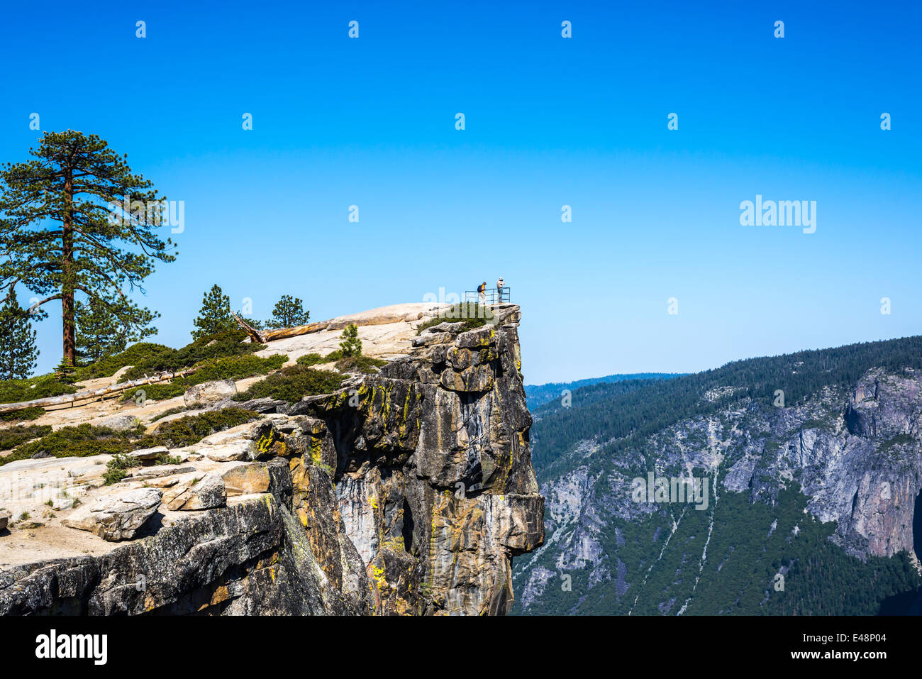 People at the Taft Point overlook. Yosemite National Park, California ...