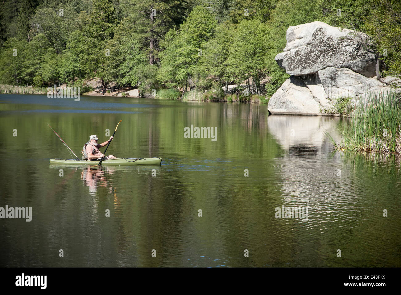 Fisherman on Lake Fulmor Stock Photo - Alamy
