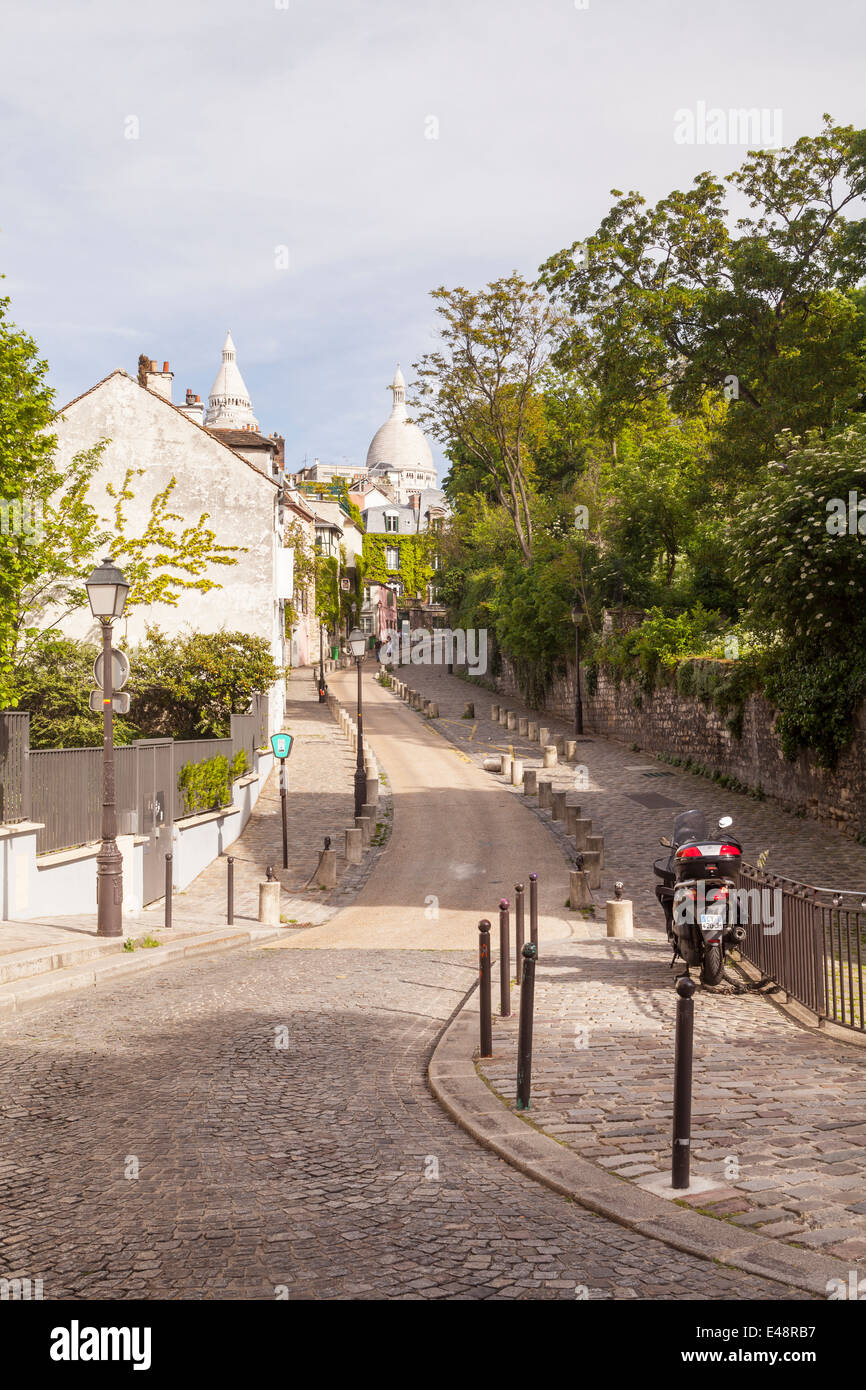 Place Dalida in Montmartre, Paris. Sacre Coeur is seen rising above the ...