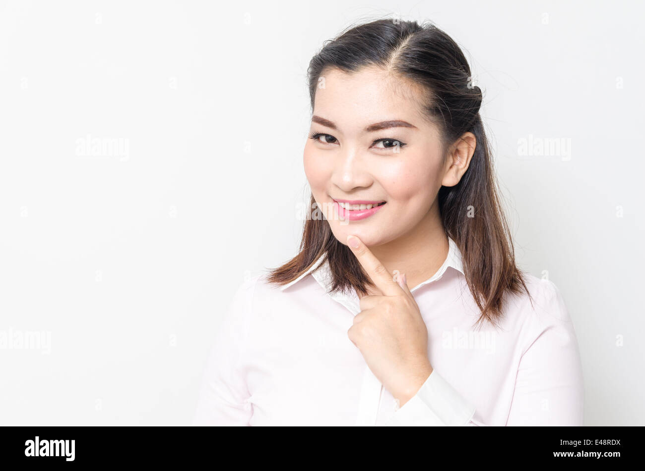 Portrait of smiling business woman, isolated on white background ...