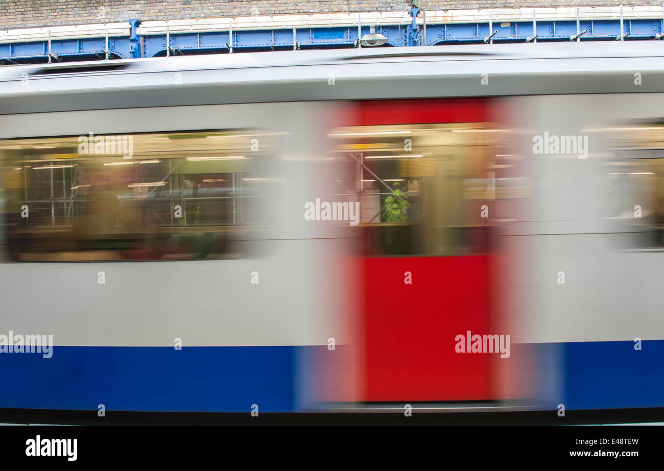 Abstract motion blur of train traveling through a station Stock Photo ...