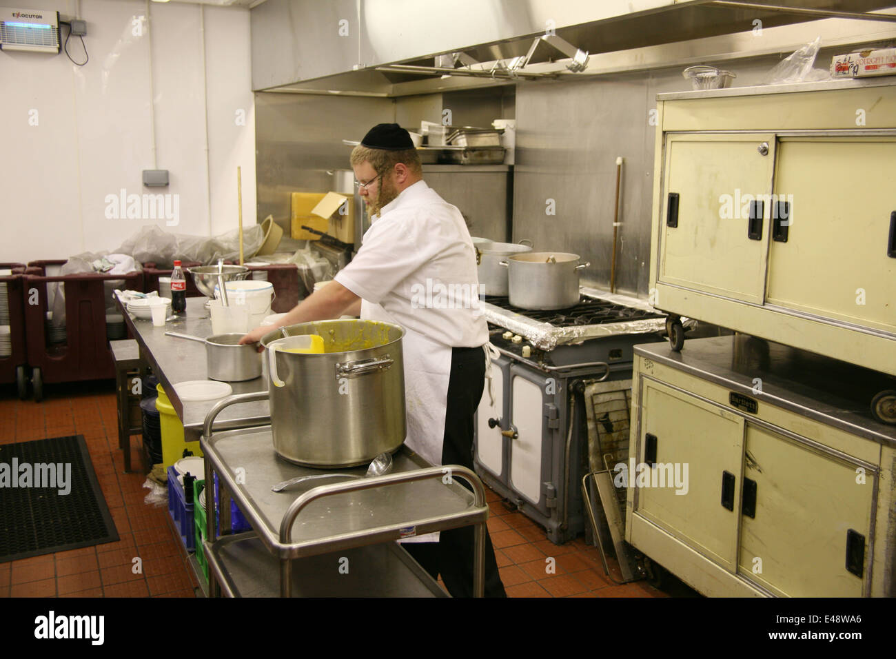 Orthodox Jews cooking in a kosher kitchen London Stock Photo - Alamy