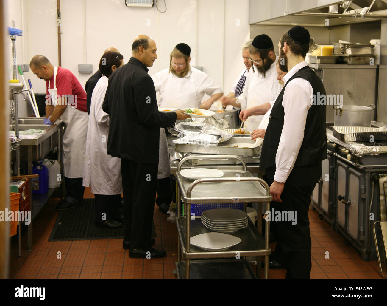 Orthodox Jews cooking in a kosher kitchen London Stock Photo - Alamy