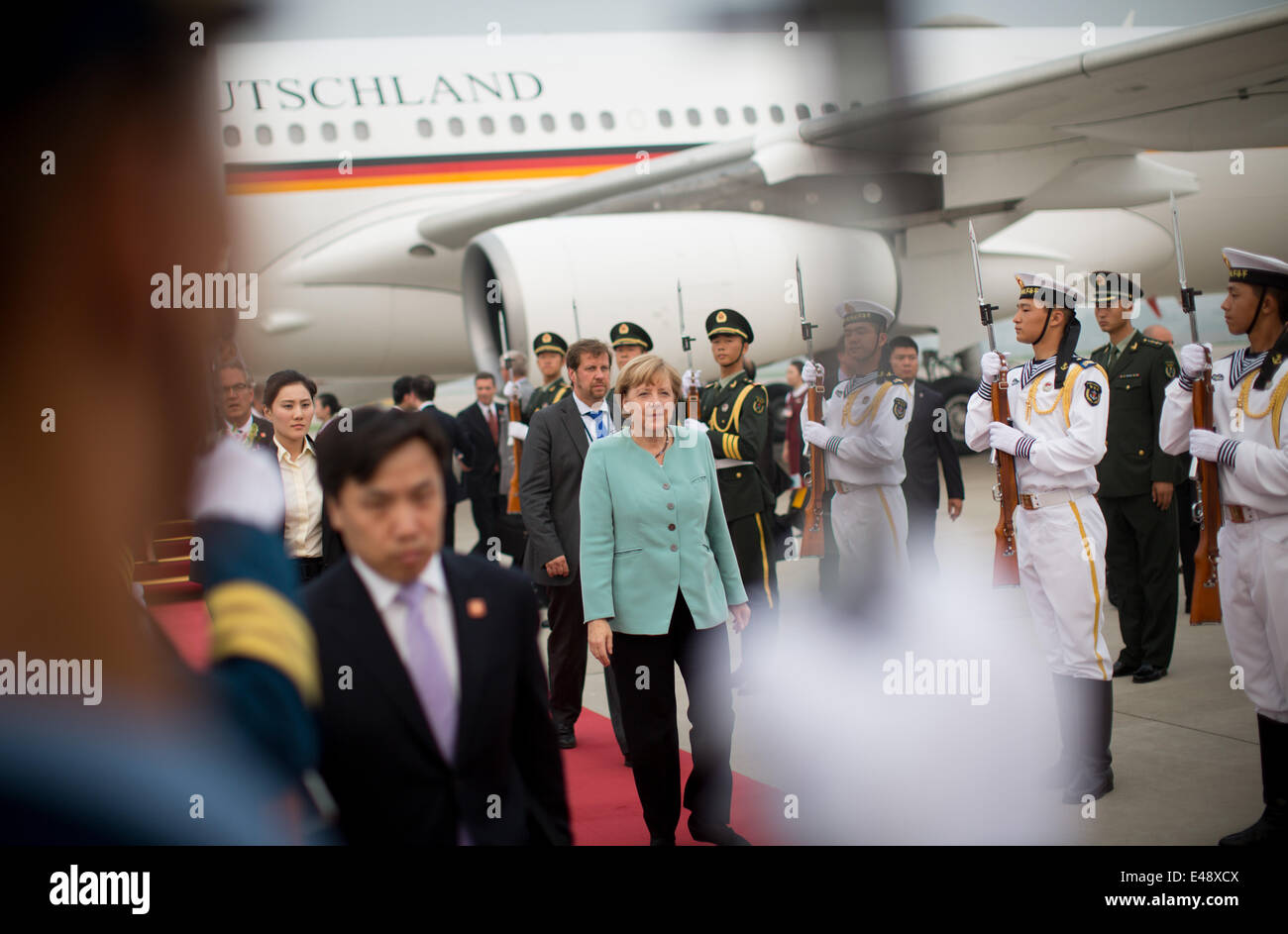 Bejing, China. 6th July, 2014. German Chancellor Angela Merkel (C, back ...