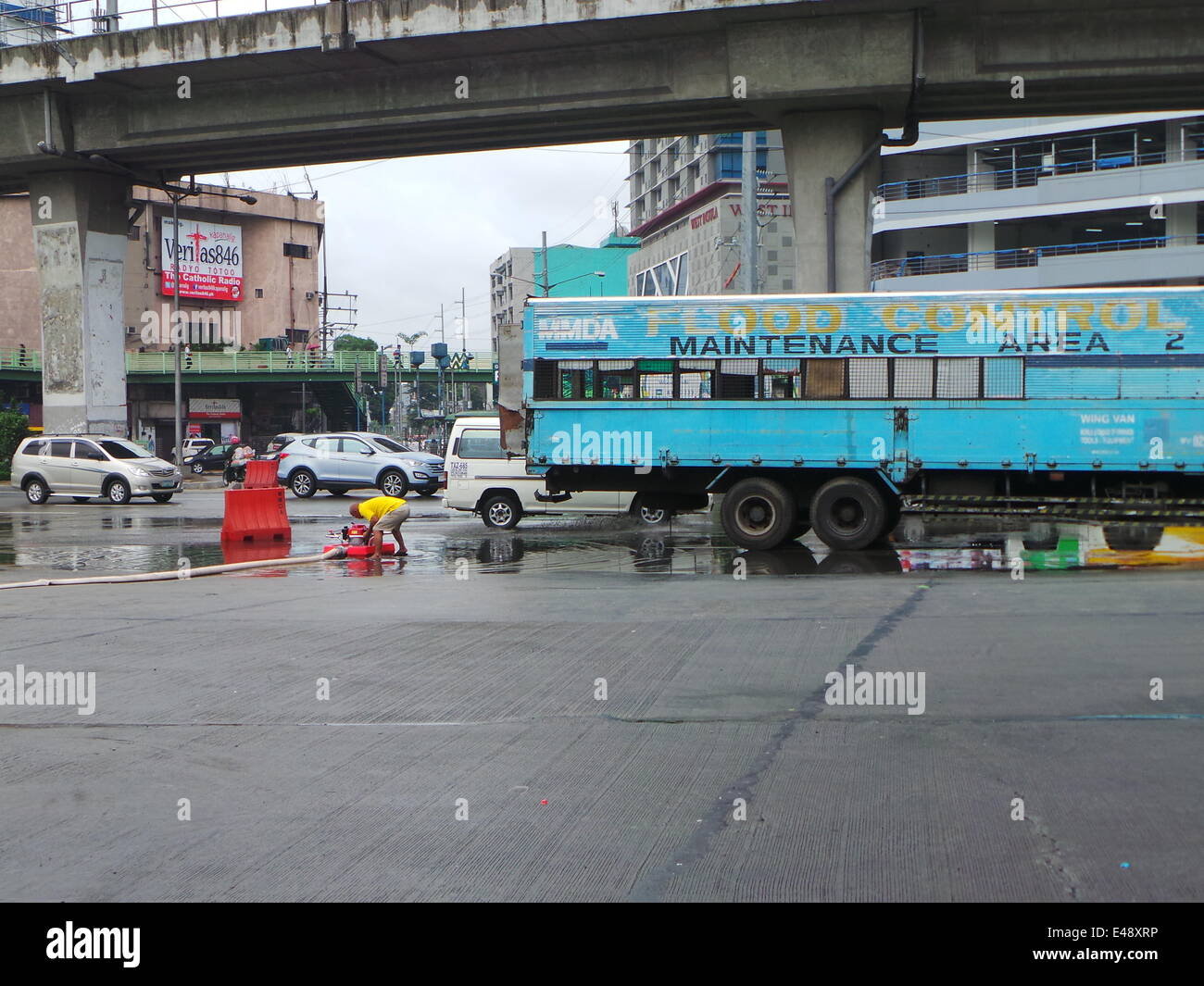 QUEZON CITY, PHILIPPINES – JULY 6, 2014: Flood control trucks of Metro ...