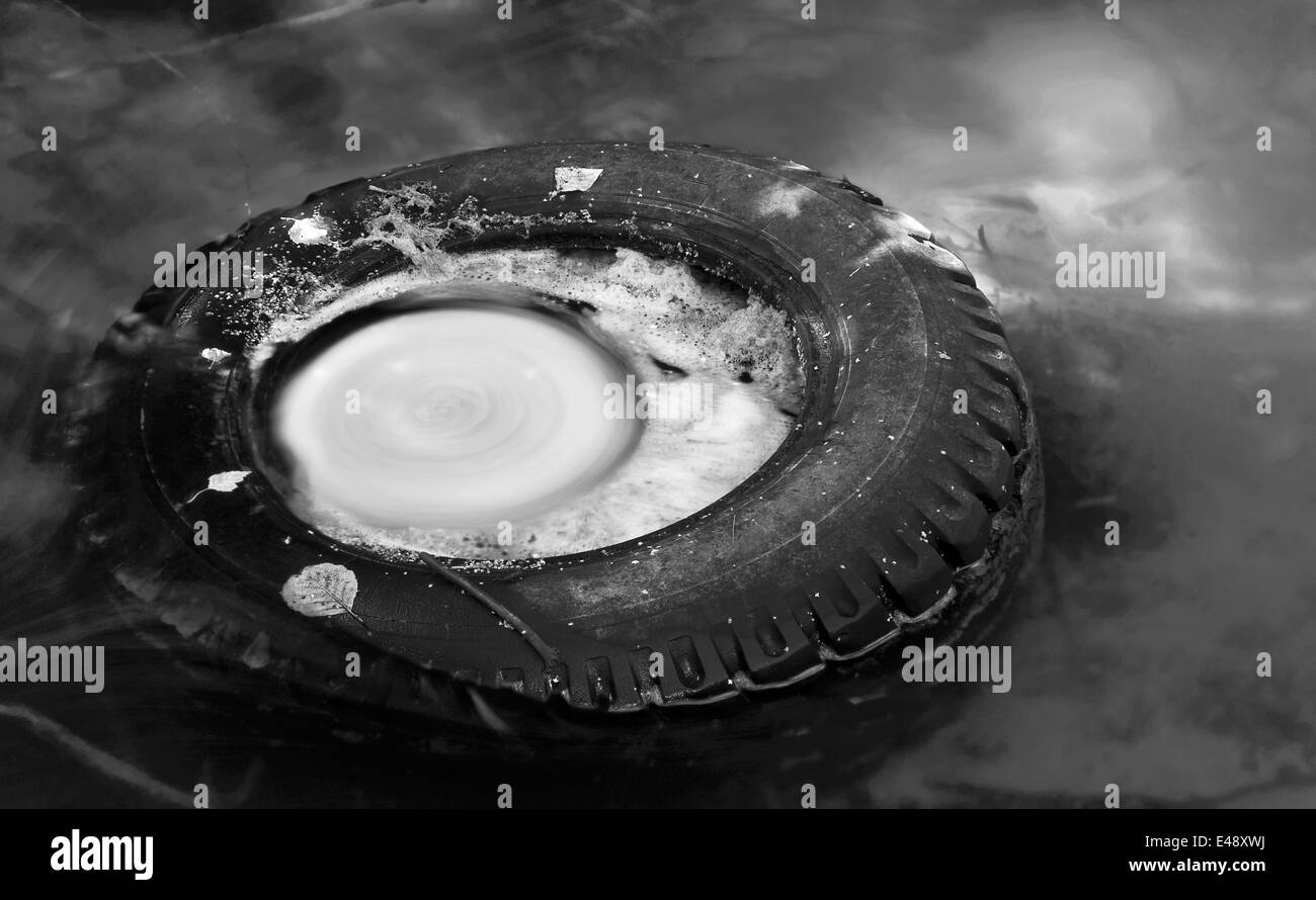 Old tyre in river hi-res stock photography and images - Alamy