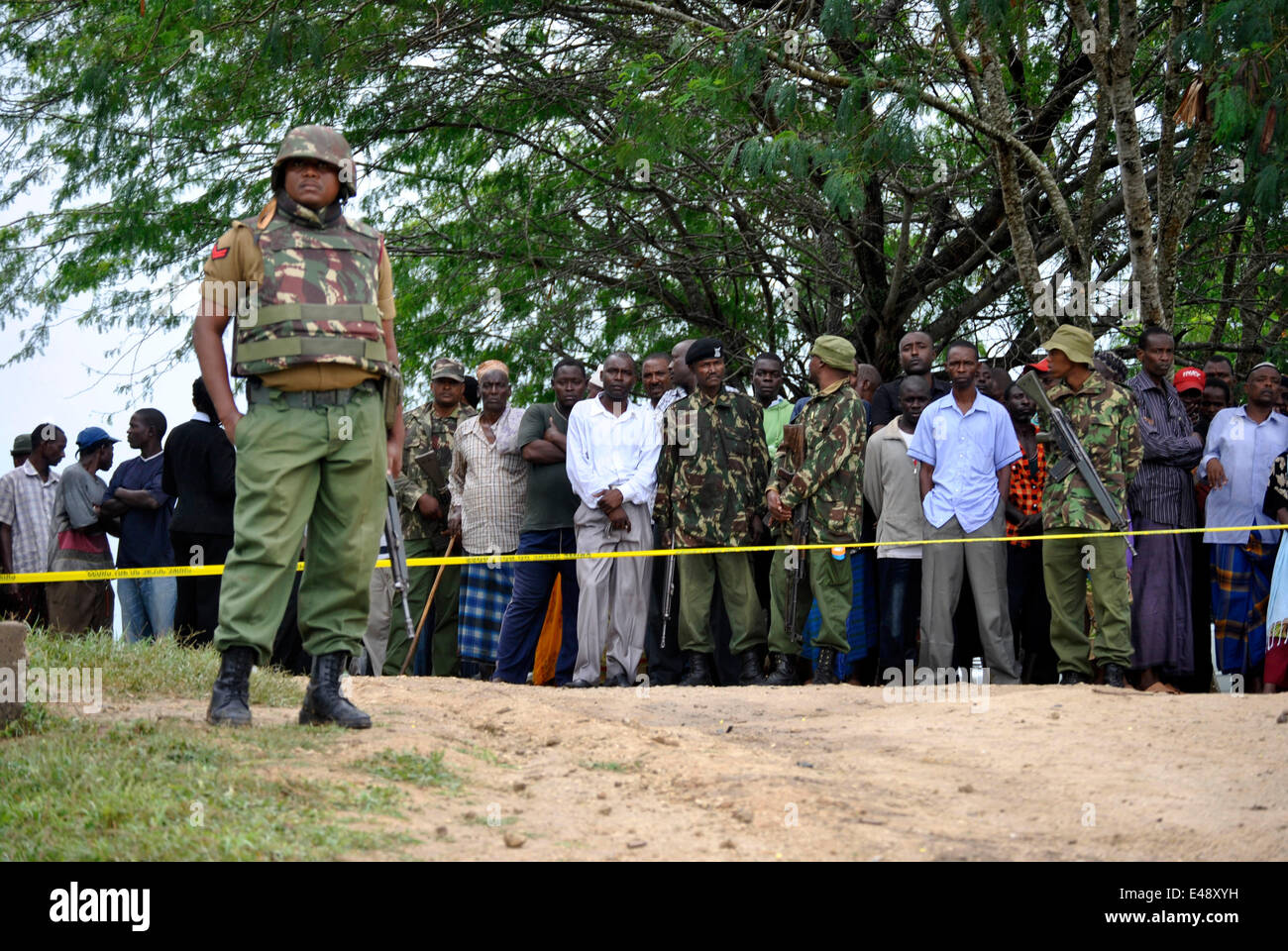 Lamu. 6th July, 2014. Kenyan security staff keep guard at Gamba police ...