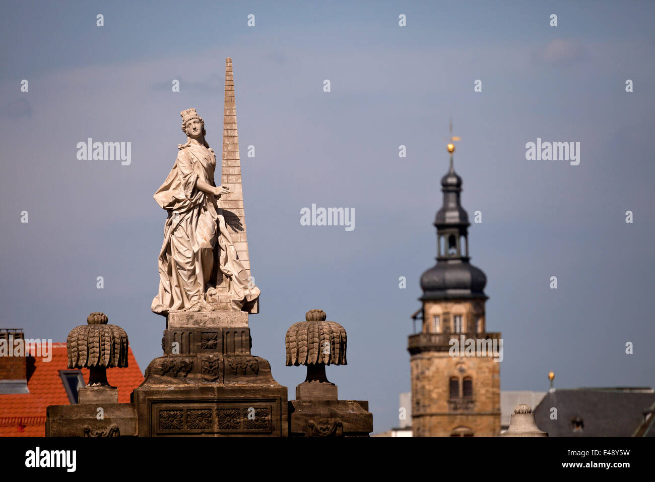 statue on Domplatz / cathedral square and the church tower of St ...