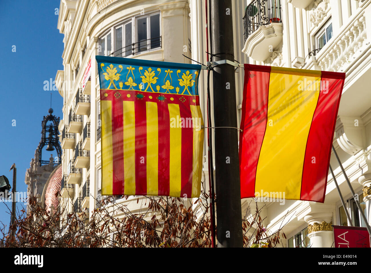 National and City banners attached to a lamp-post in Valencia Spain ...