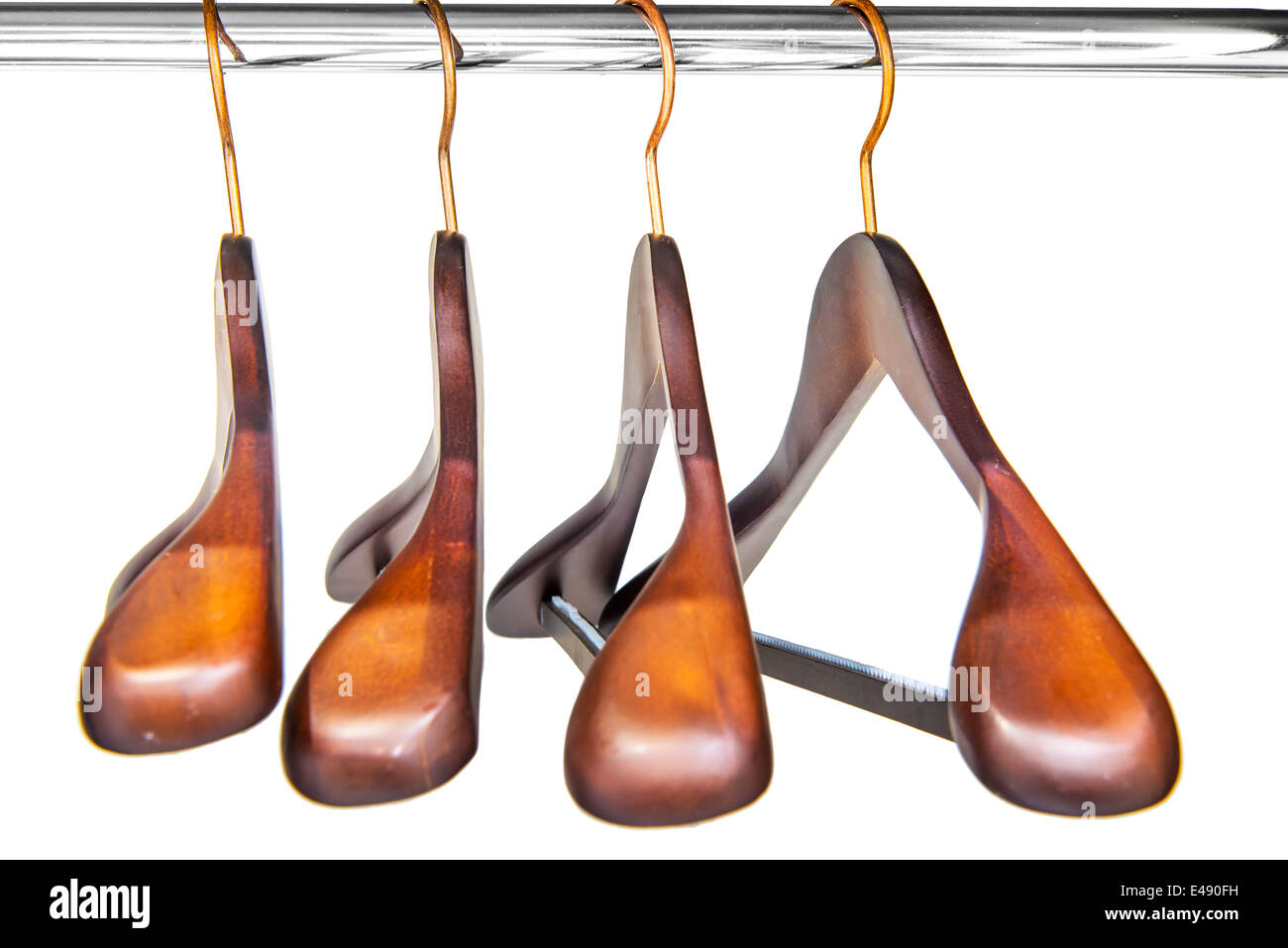 Four wooden hangers on a crossbeam Stock Photo - Alamy