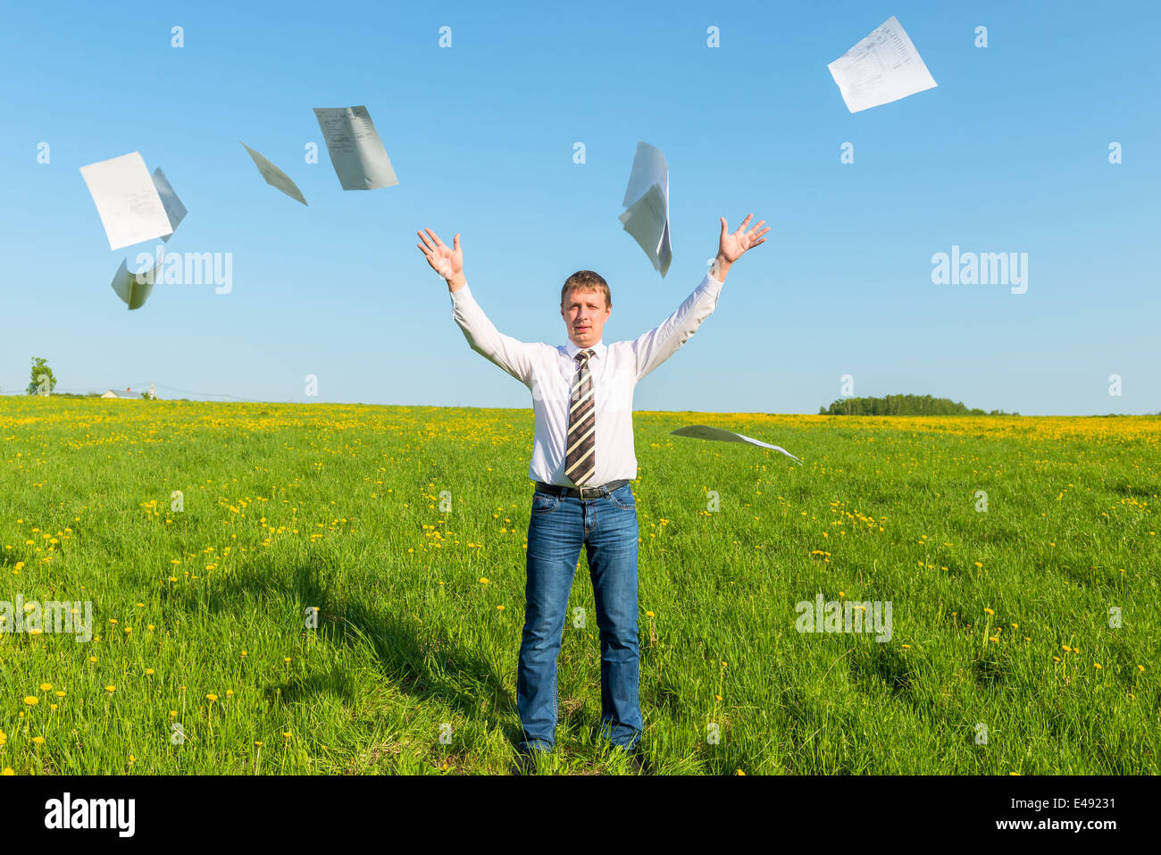 Throwing papers in the air hi-res stock photography and images - Alamy