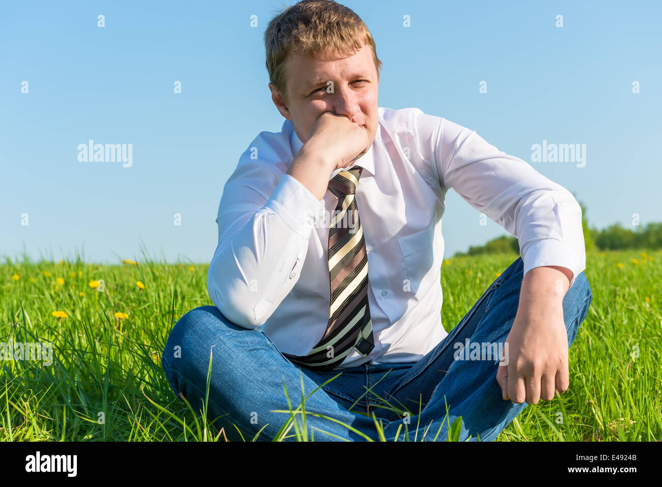 pensive businessman thinking about work in the field Stock Photo - Alamy