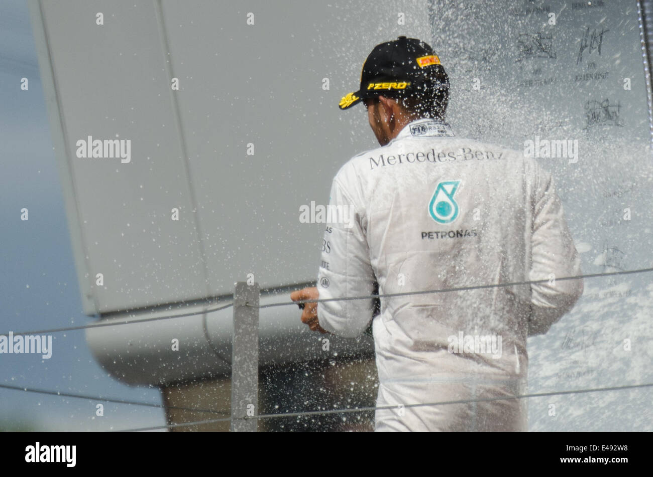 Lewis Hamilton celebrates winning the 2014 British Formula 1 Grand Prix ...