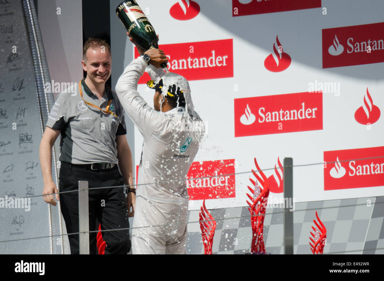 Lewis Hamilton celebrates winning the 2014 British Formula 1 Grand Prix ...
