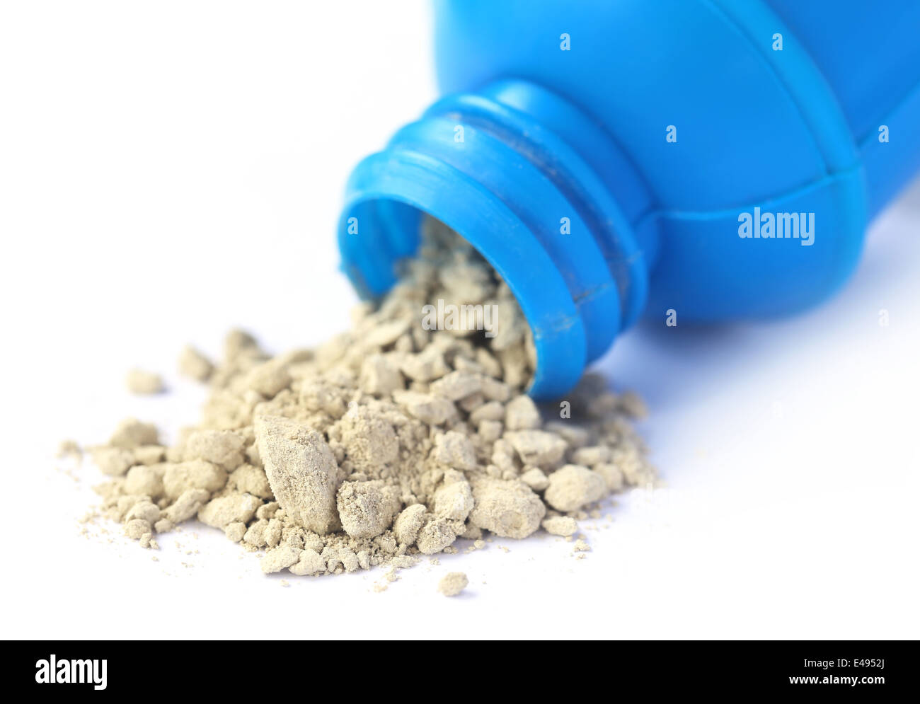 Tooth powder with bottle over white background Stock Photo - Alamy
