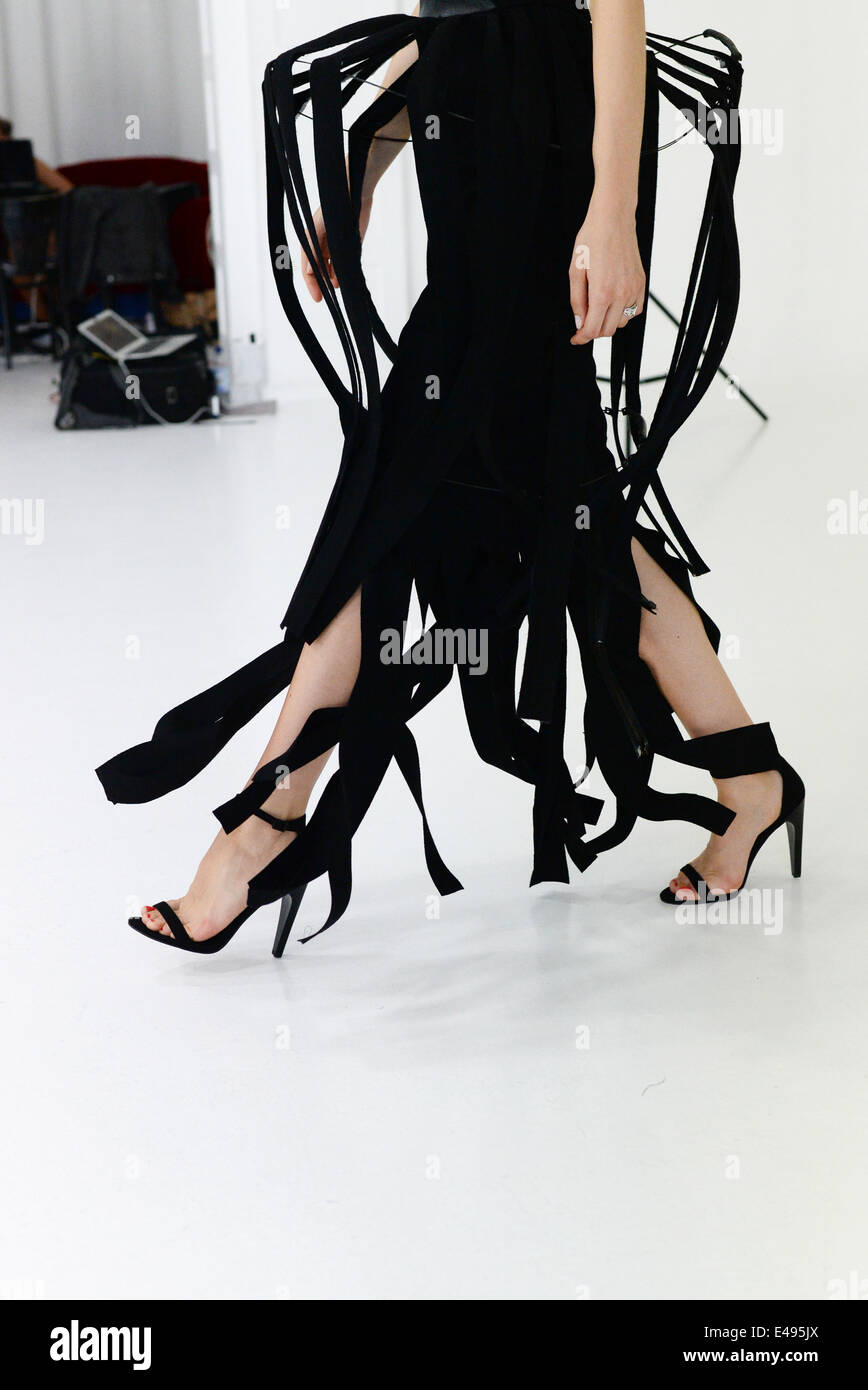 Berlin, Germany. 06th July, 2014. A model presents an outfit by Irish ...
