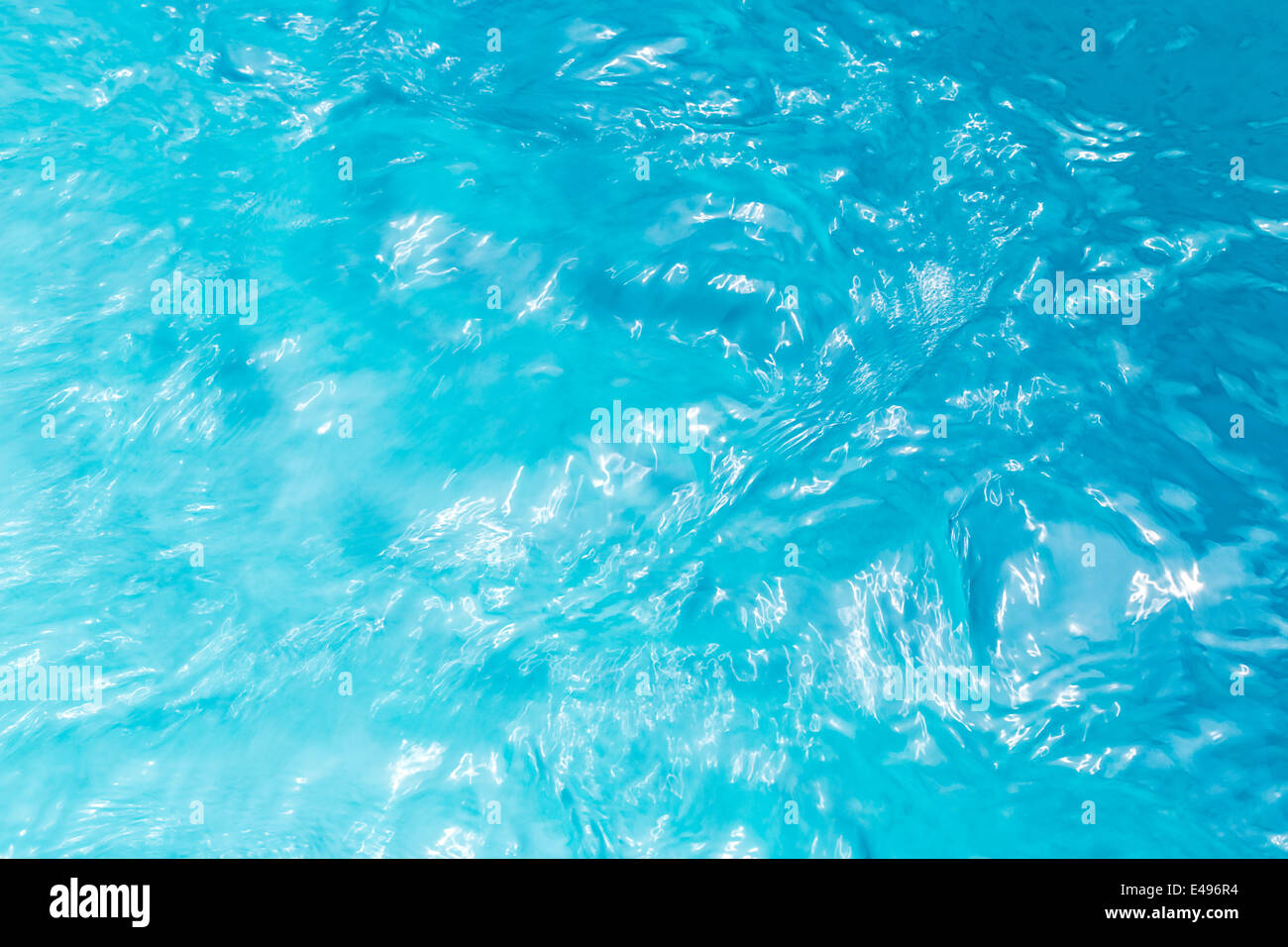 Close-up of blue water waves in a swimming pool Stock Photo - Alamy