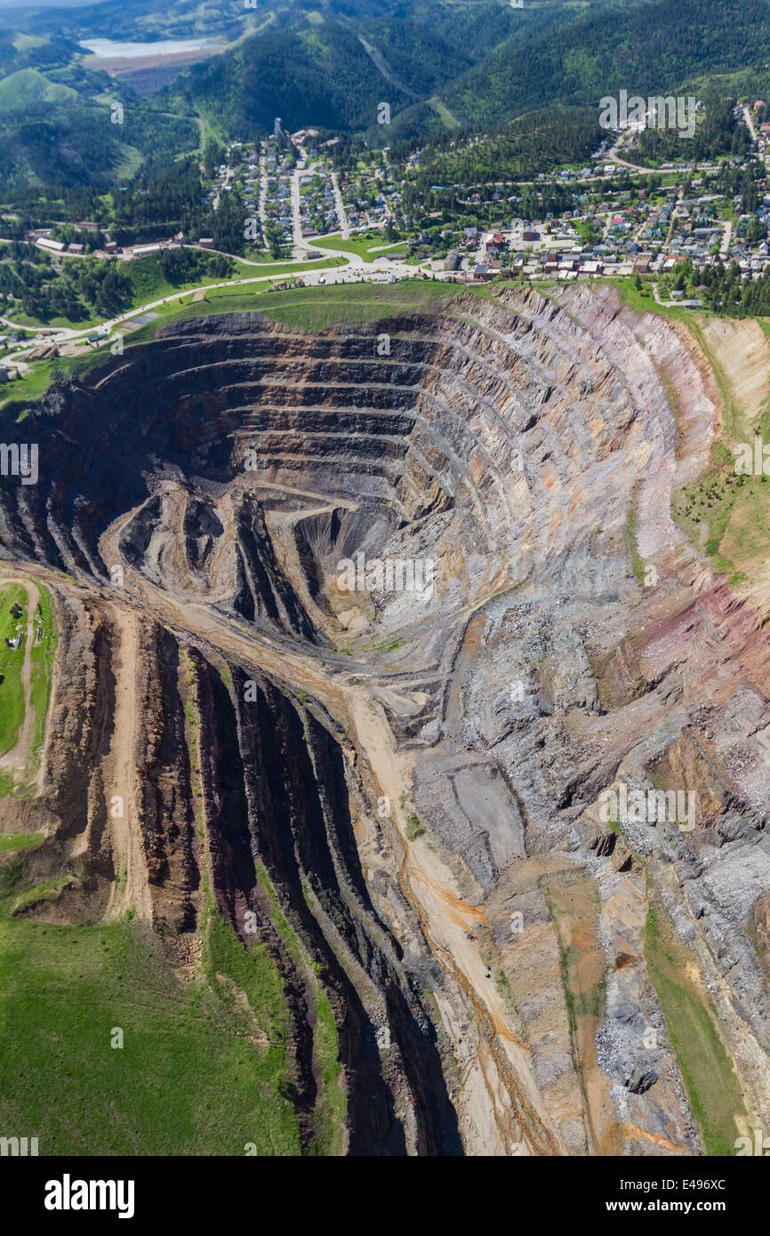 aerial view of an abandoned open pit mine and the town of Lead, South ...
