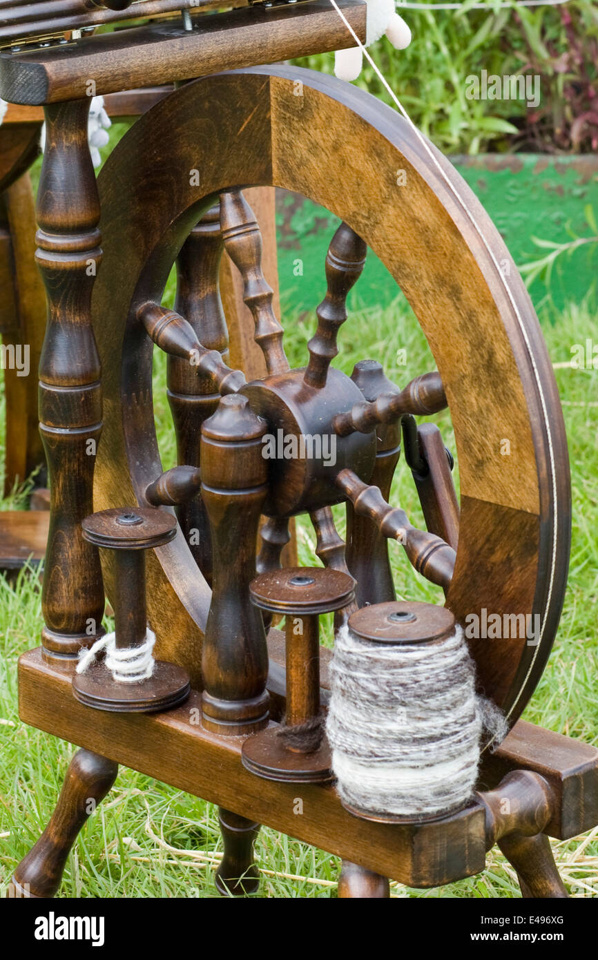 Wooden spinning wheel hi-res stock photography and images - Alamy