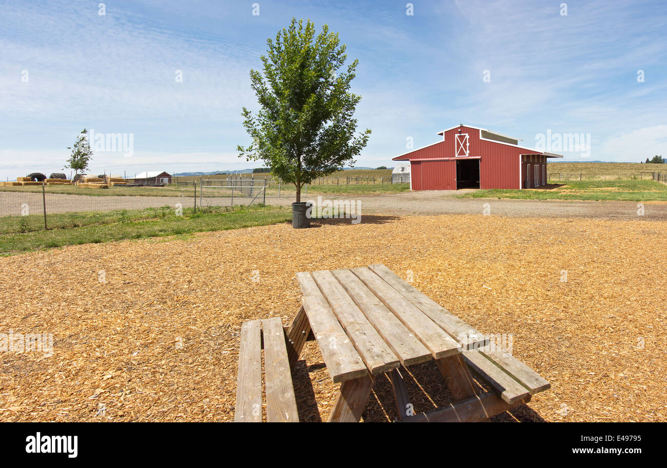Country barn picnic table and yard in a countryside Stock Photo - Alamy