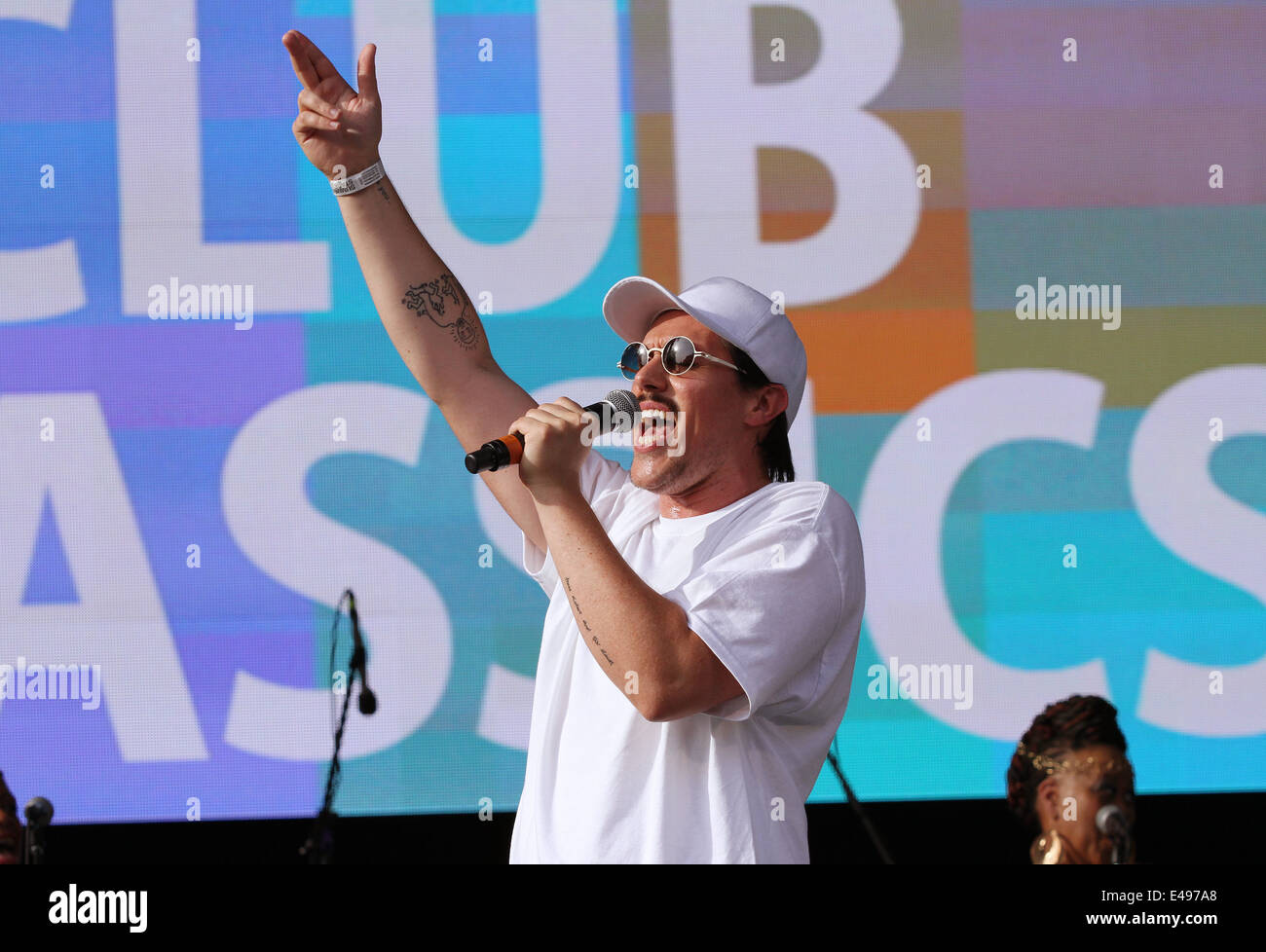 Disco performer Sam Sparro (c) sings at the Club Classics concert at ...