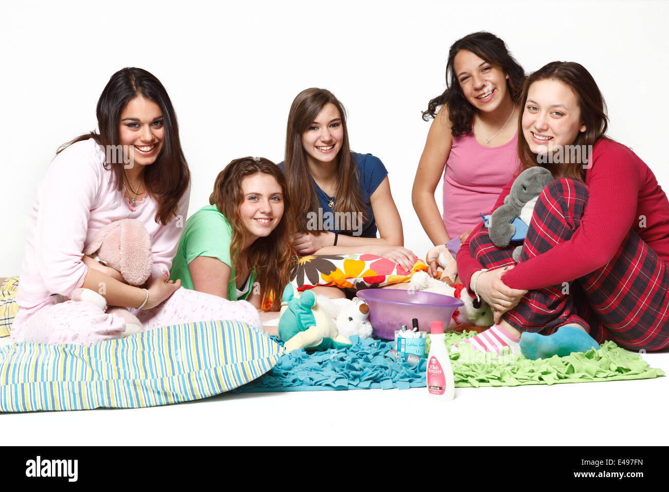 a group of five girls having fun at a sleep over Stock Photo - Alamy