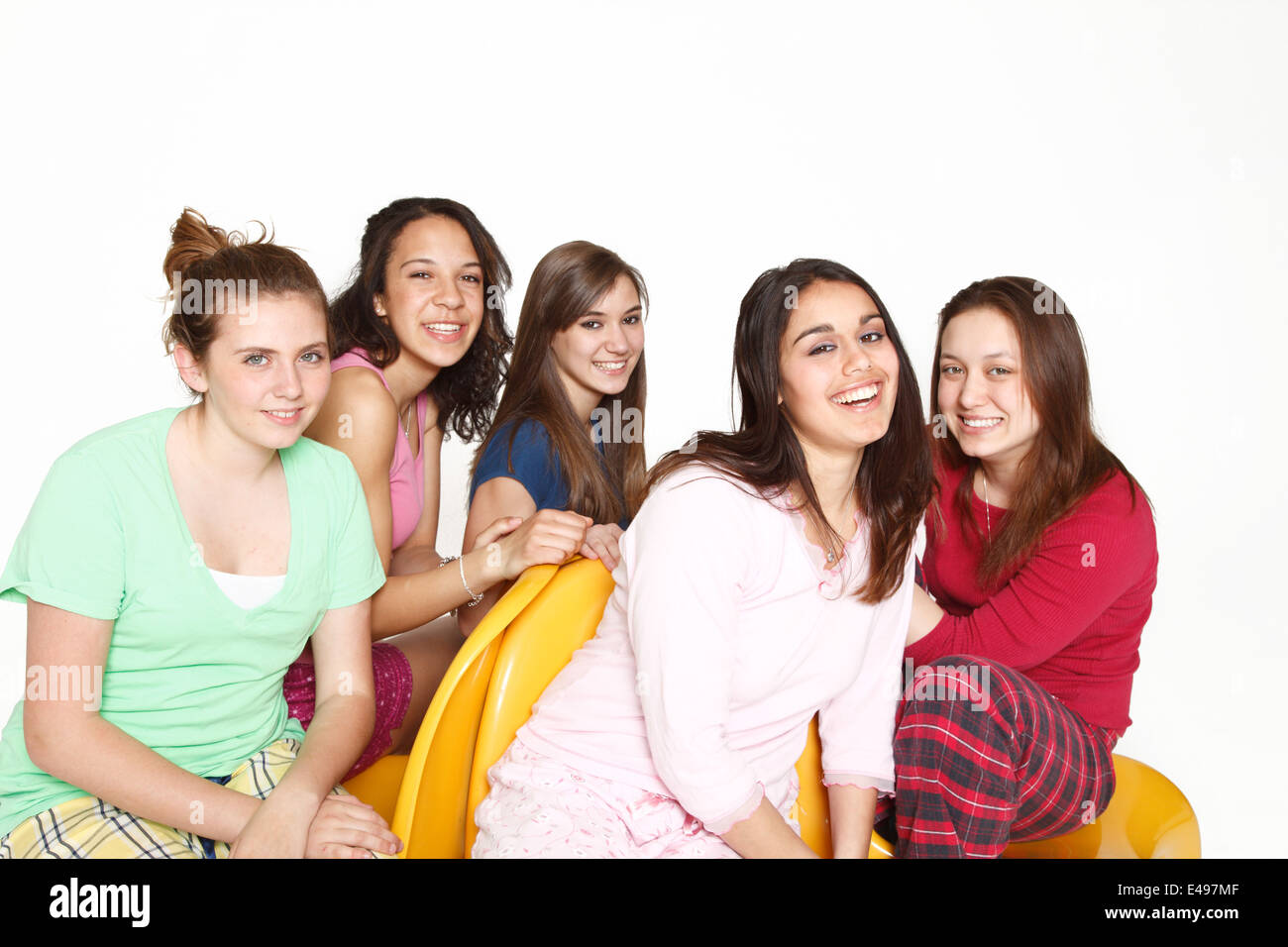 a group of five girls having fun at a sleep over Stock Photo - Alamy