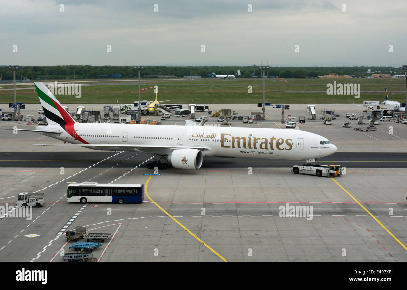 A Boeing 777 of Emirates air line is pushed back from the stand at ...