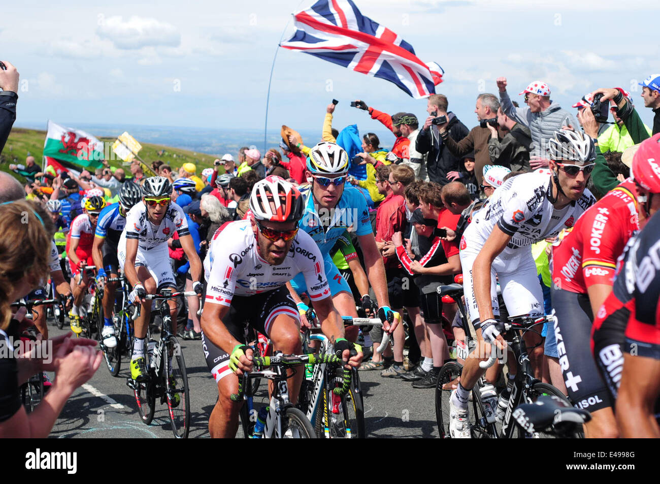 Holme Moss, Yorkshire, UK. 06th July 2014.Tour riders faced along haul ...