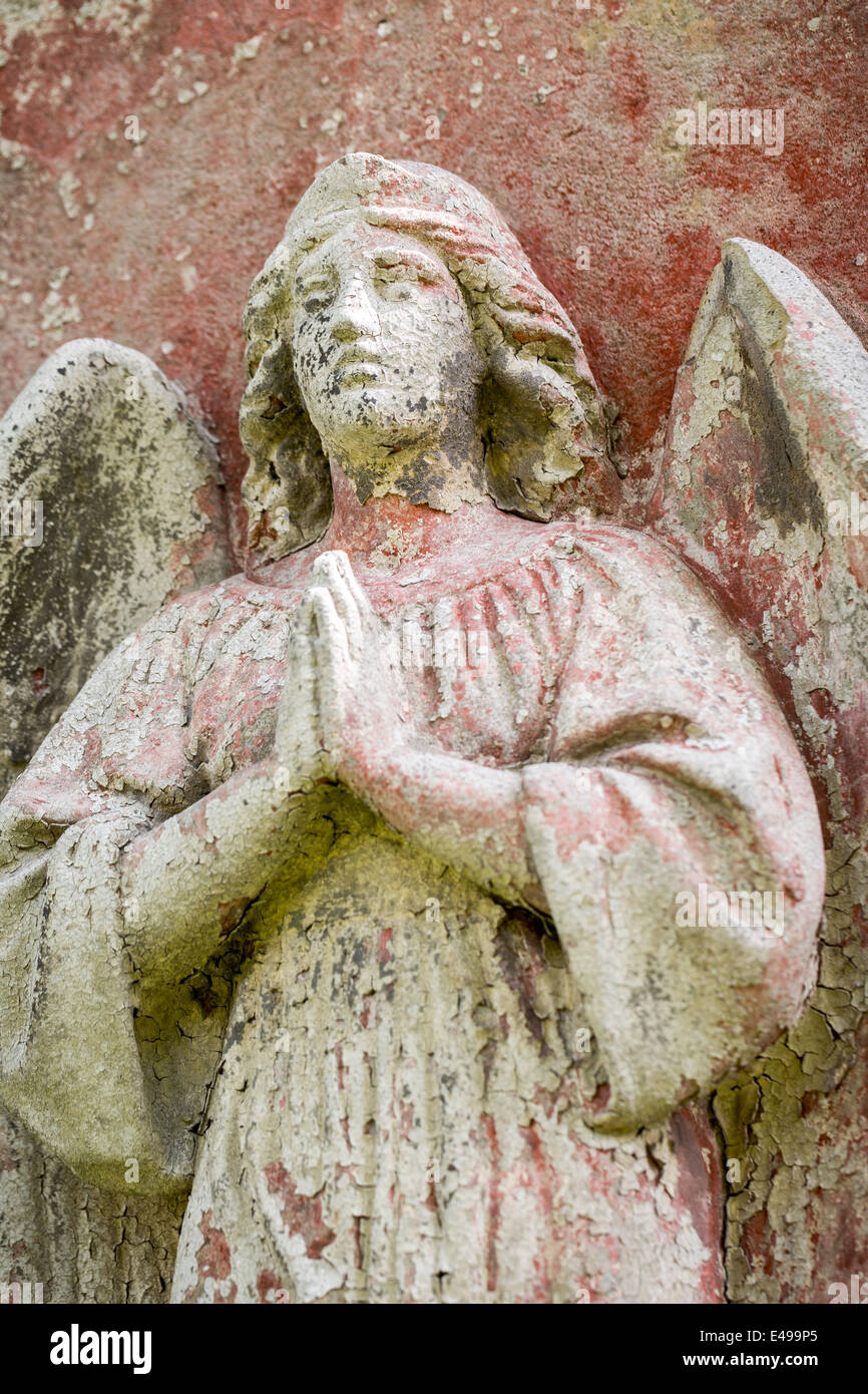 old angel sculpture with peeling off paint. Unknown Artist of the 18th ...